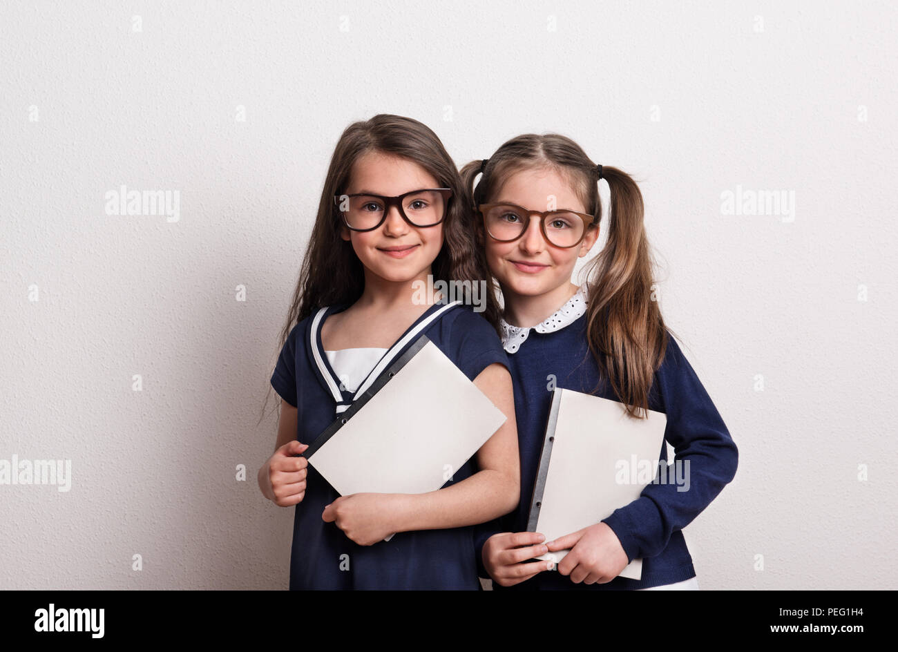 Two schoolgirls in uniform hi-res stock photography and images - Alamy