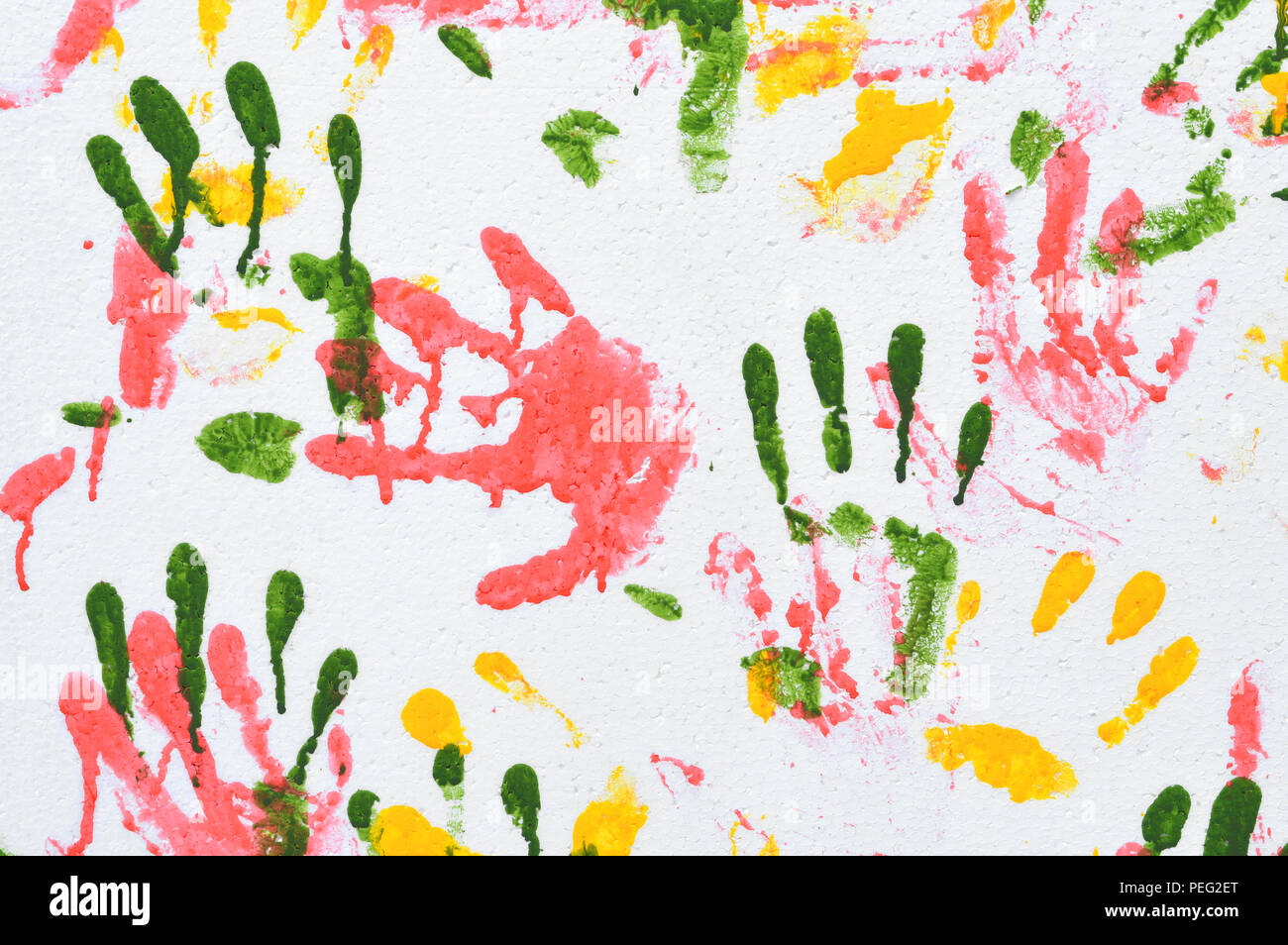 colorful handprint on wall use for background Stock Photo - Alamy