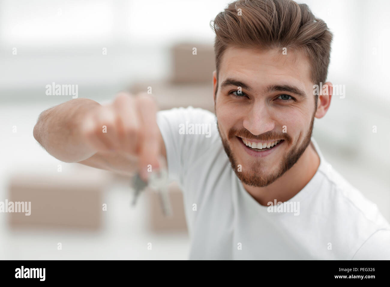 closeup.happy the man with the keys to new apartments Stock Photo - Alamy