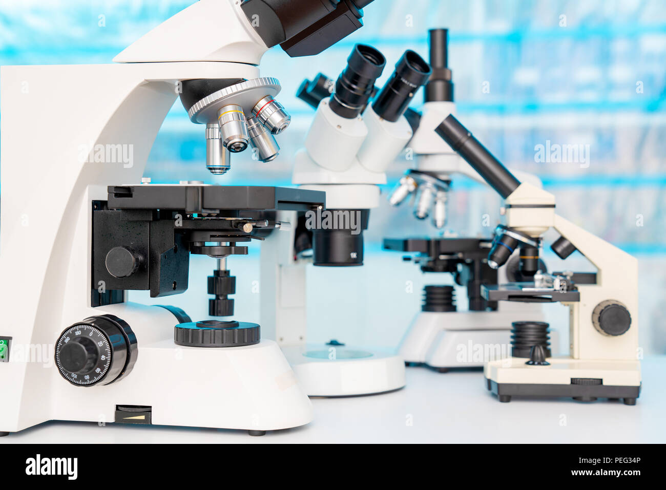 Four microscopes of different designs in the laboratory Stock Photo - Alamy