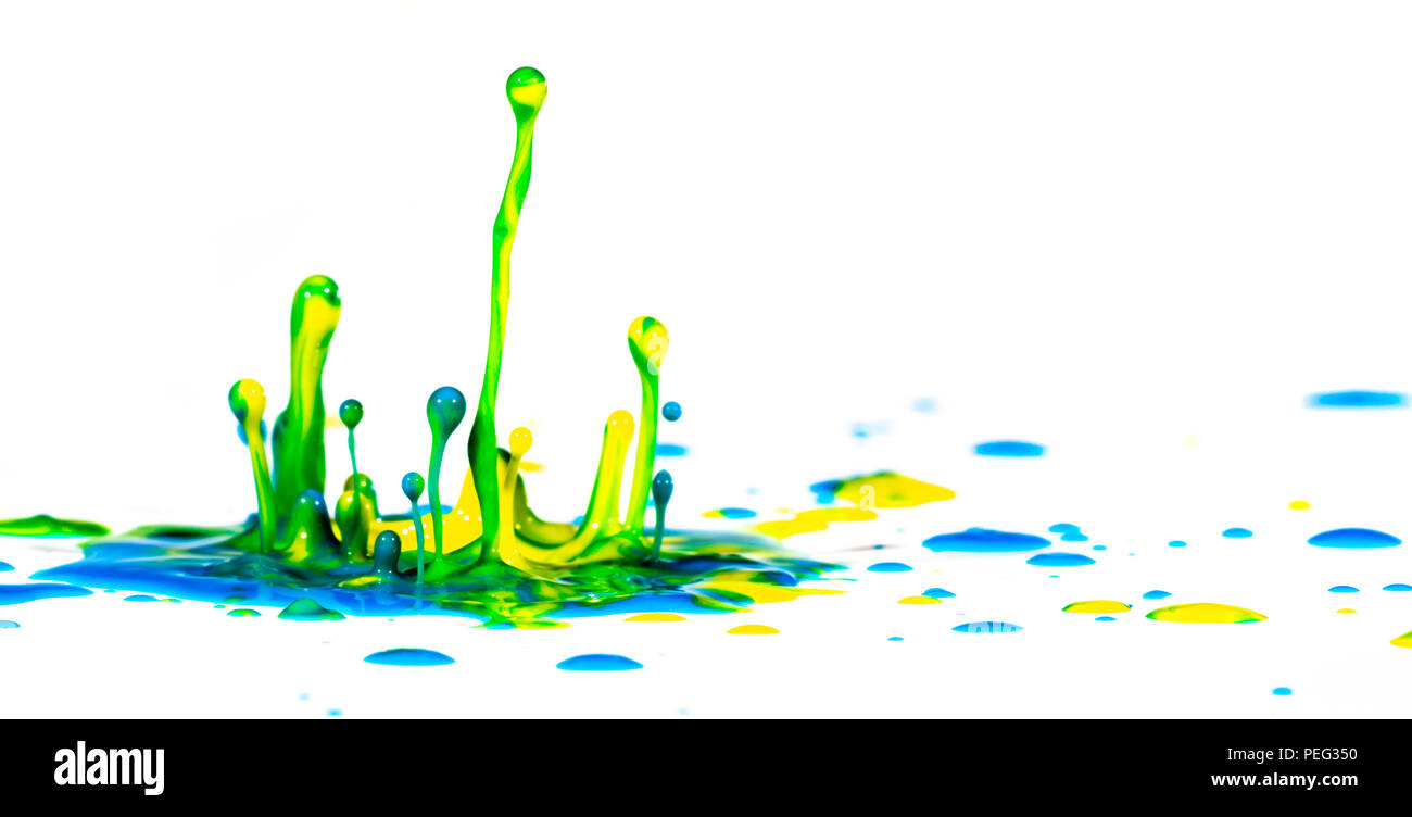 splash of color ink on white background Stock Photo - Alamy