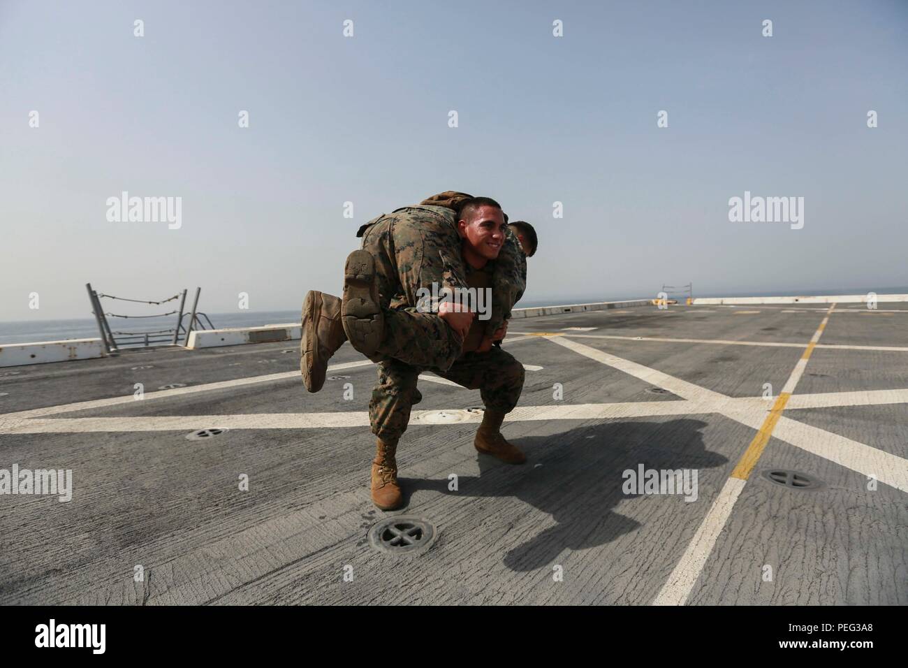 GULF OF ADEN (Aug. 18, 2015) U.S. Marine Cpl. Jose Martinez, exercises ...