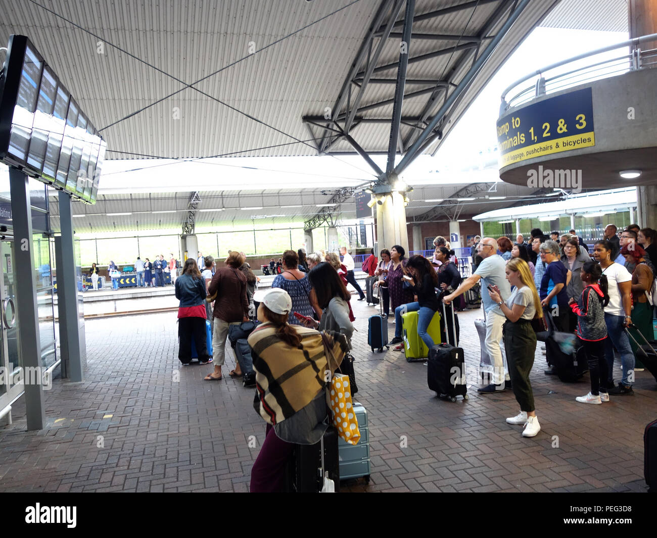 Train delays at Manchester Airport station leaves passengers to watch ...