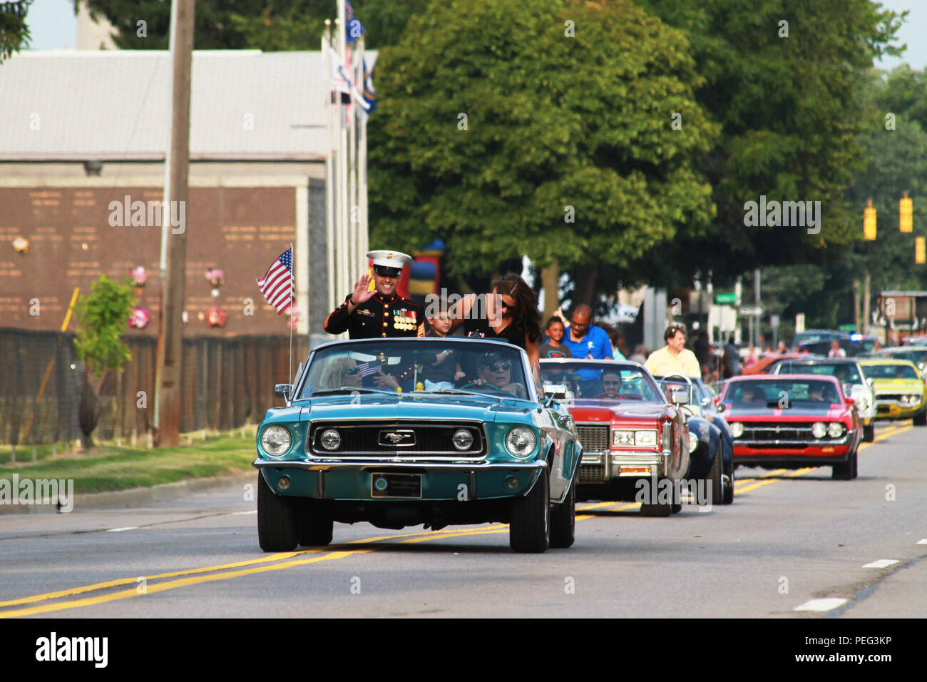 U.S. Marine Corps Gunnery Sgt. Dominic Freda, cruises down Woodward ...