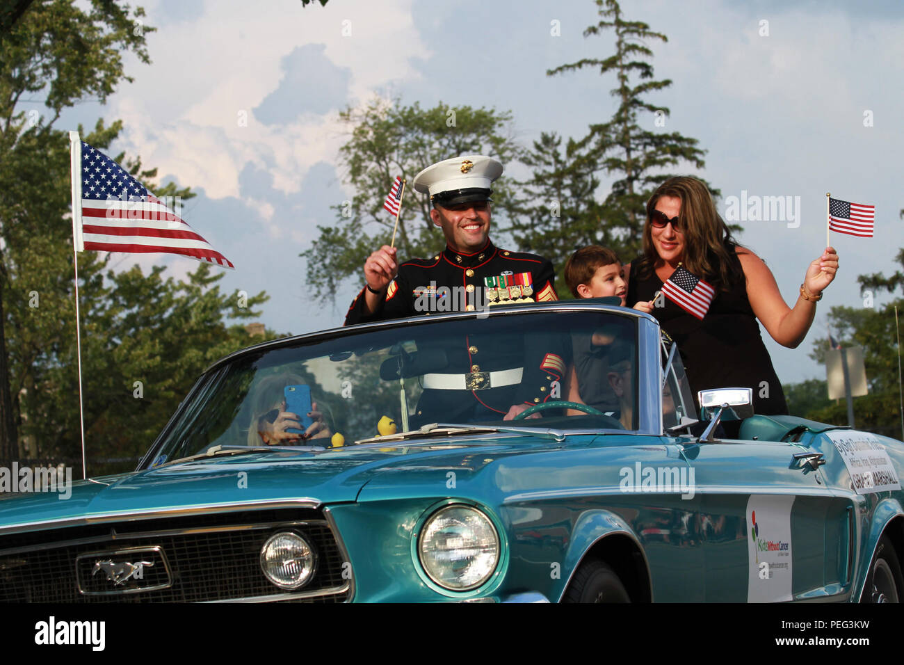 U.S. Marine Corps Gunnery Sgt. Dominic Freda, cruises down Woodward ...