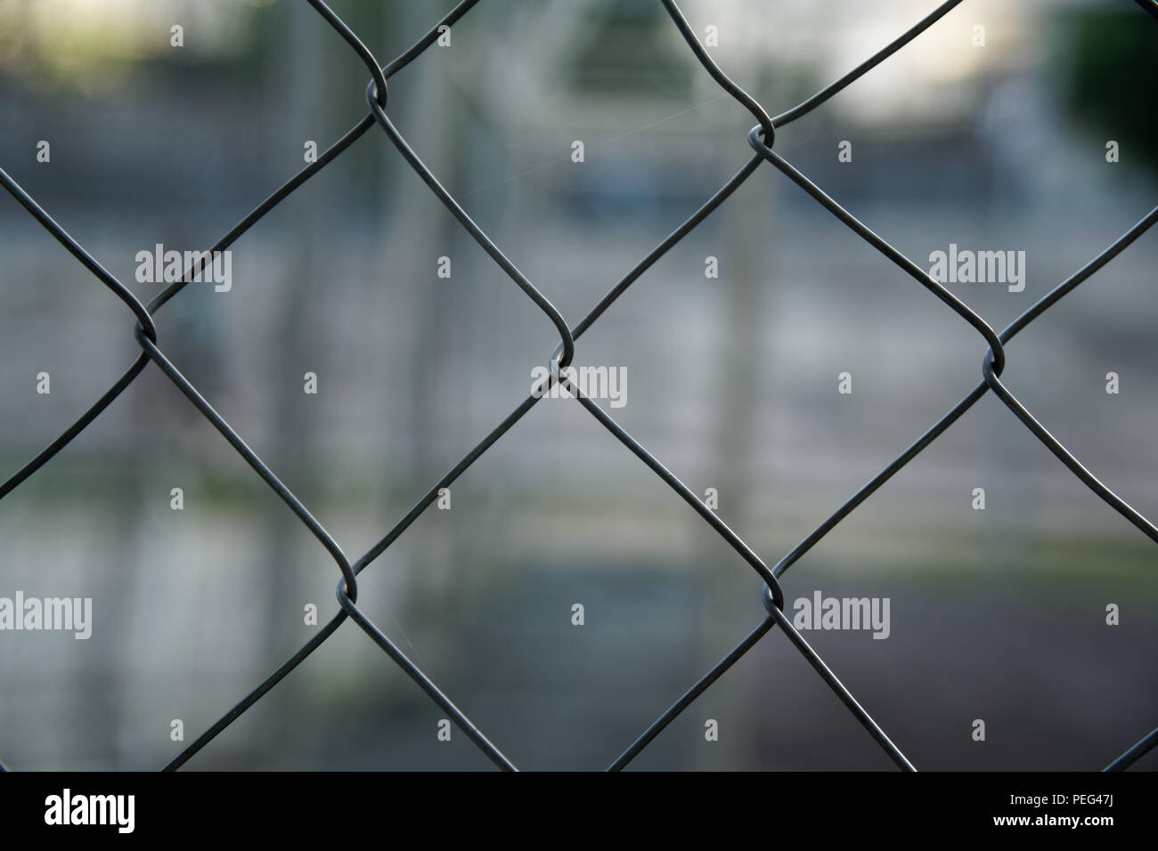 Mesh aluminium wire with defocused background, business concept Stock ...