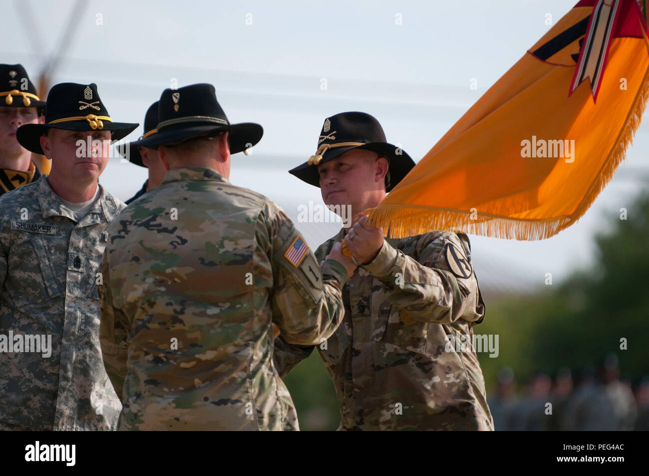 Command Sgt. Maj. Scott Peare (left), former command sergeant major of ...