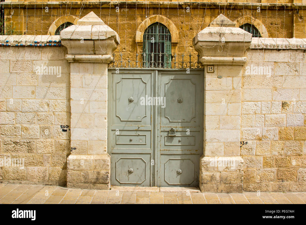 10 May 2018 A double doored steel gate into a property in the Arab ...
