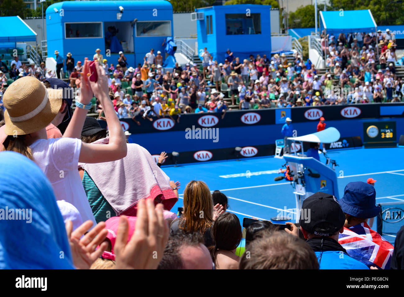 People cheer for the tennis players in Australian Open, Melbourne Stock ...