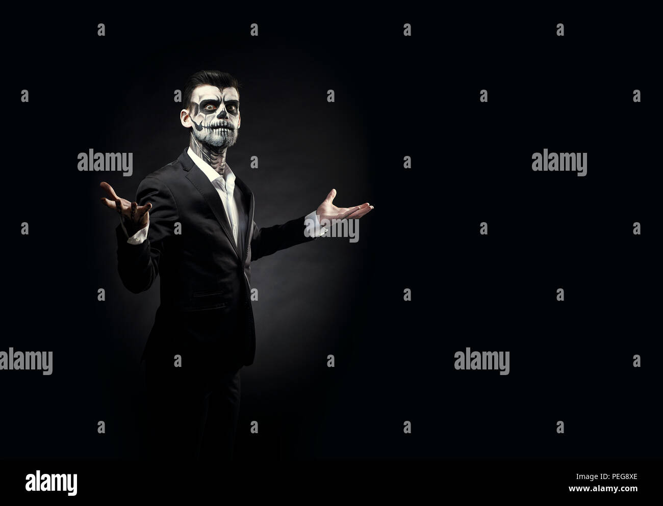 Portrait of man with Halloween skull makeup on the black backgro Stock ...