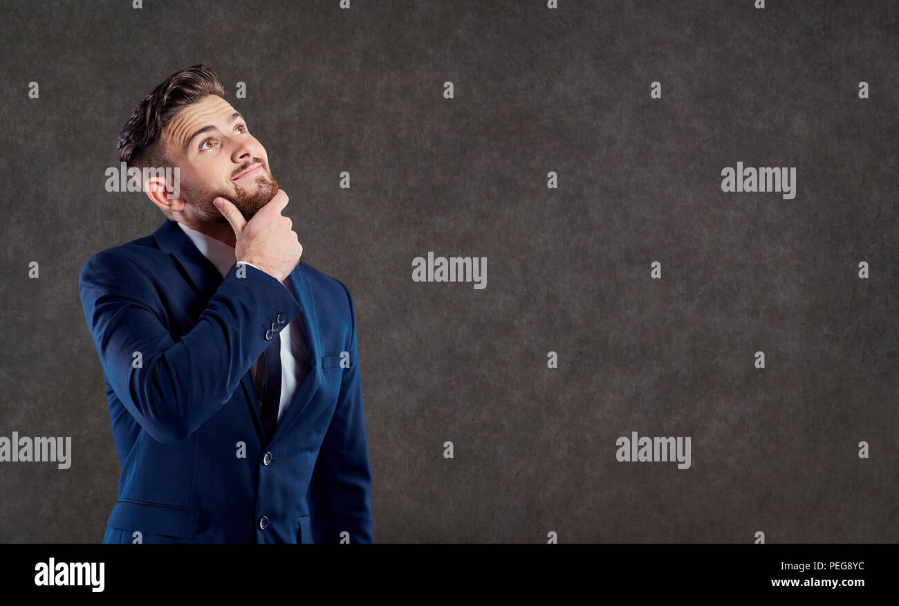 Man suit thinking hi-res stock photography and images - Alamy