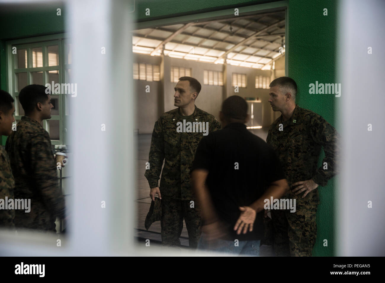 U.S. Marines assigned to 4th Civil Affairs Group conduct a site ...