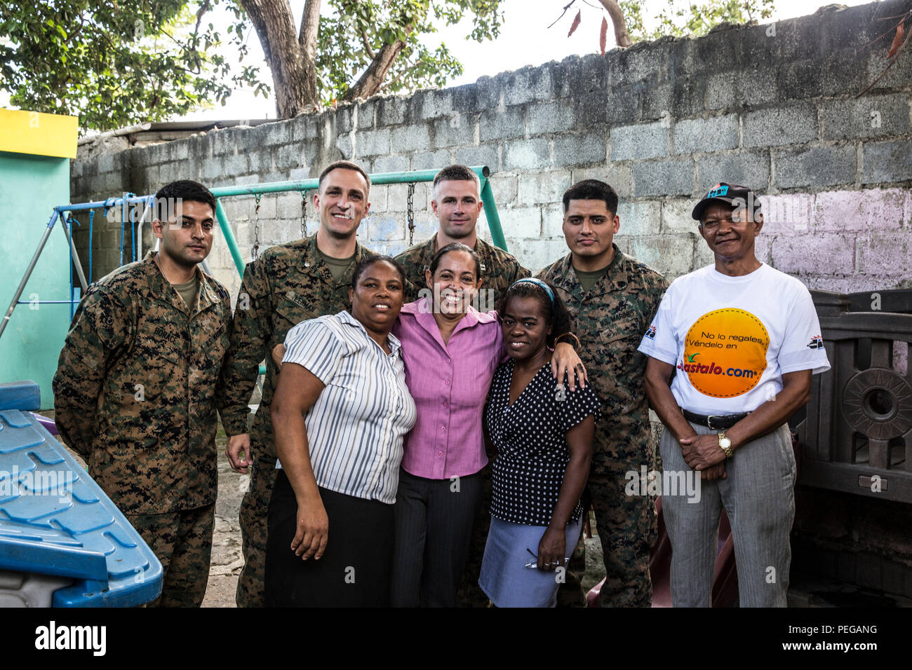 U.S. Marines assigned to 4th Civil Affairs Group pose for a group photo ...