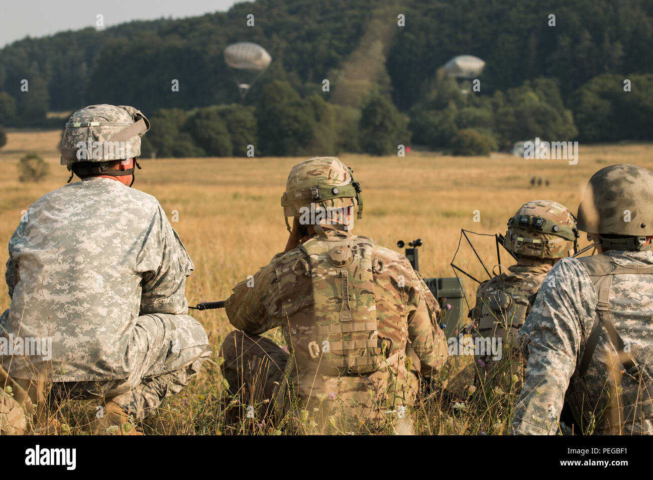 A U.S. Army 173rd Airborne Brigade drop zone safety team monitors wind ...