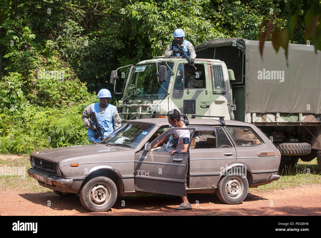 U.S. Army Spc. Brandon Barnes, left, and Pfc. Matthew Leath jr., right ...