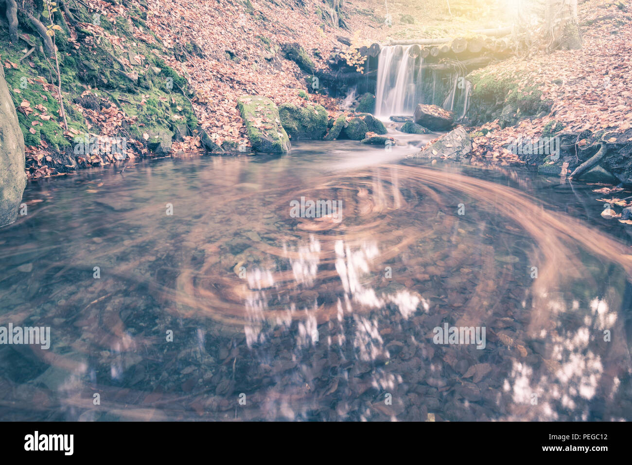 Autumn forest small waterfall Stock Photo - Alamy