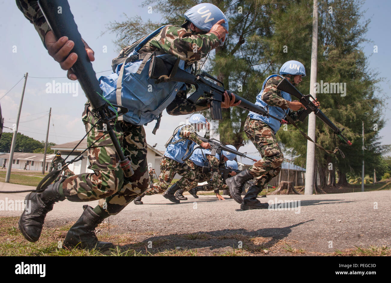 Nepalese Army soldiers rush to provide security during peacekeeping ...
