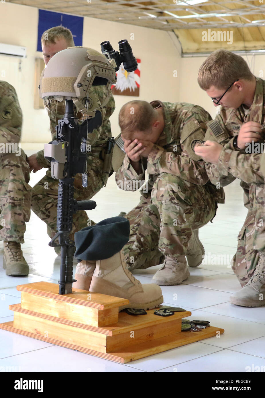 U.S. Army Soldiers and teammates of 1st Sgt. Peter "Drew" McKenna, Jr ...