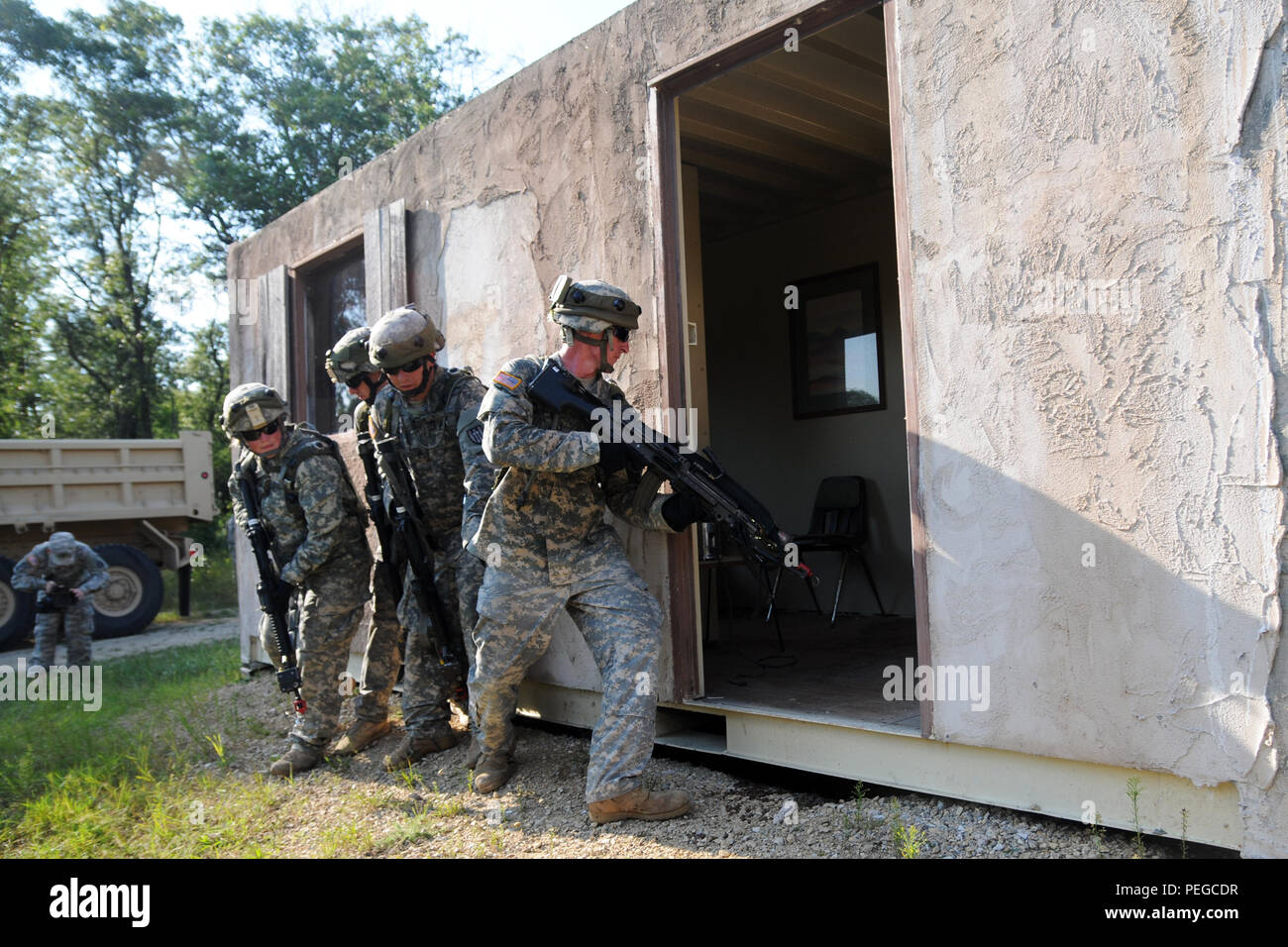 U.S. Army Reserve Soldiers of the 461st Engineer Company enter and ...