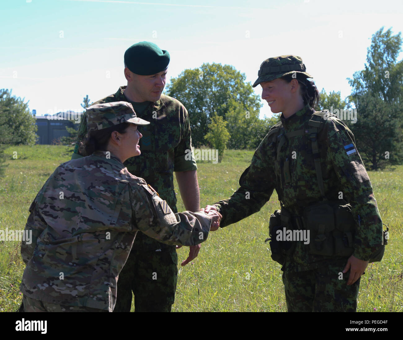 Command Sgt. Maj. of U.S. Army Europe Sheryl D. Lyon is greeted by ...