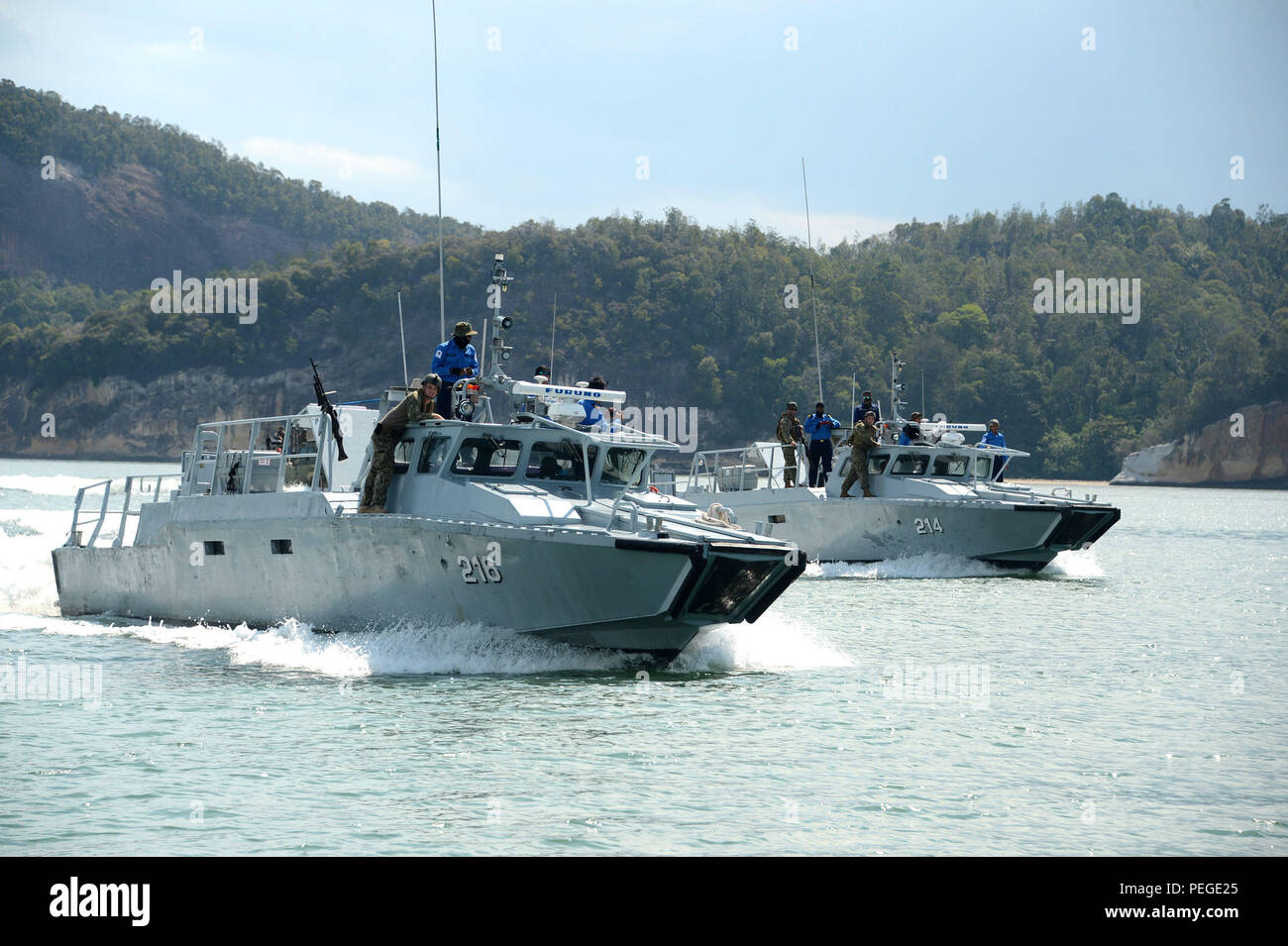 150817-N-FN215-244 SANDAKAN, Malaysia (Aug. 17, 2015) - Members of the ...