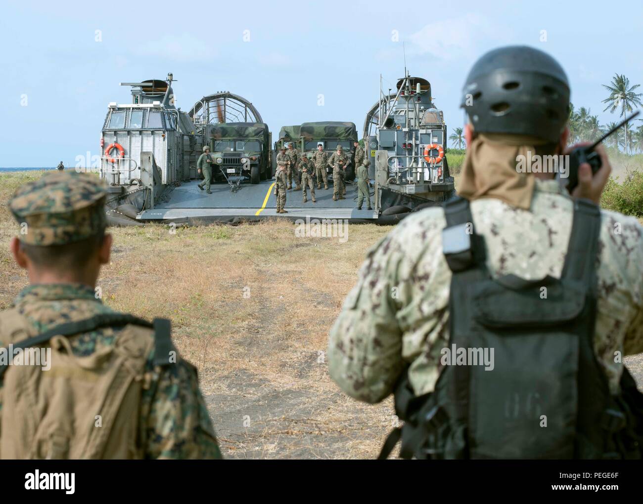 150807-N-SU278-109 Indonesia (Aug. 7, 2015) – A Sailor and Marine ...