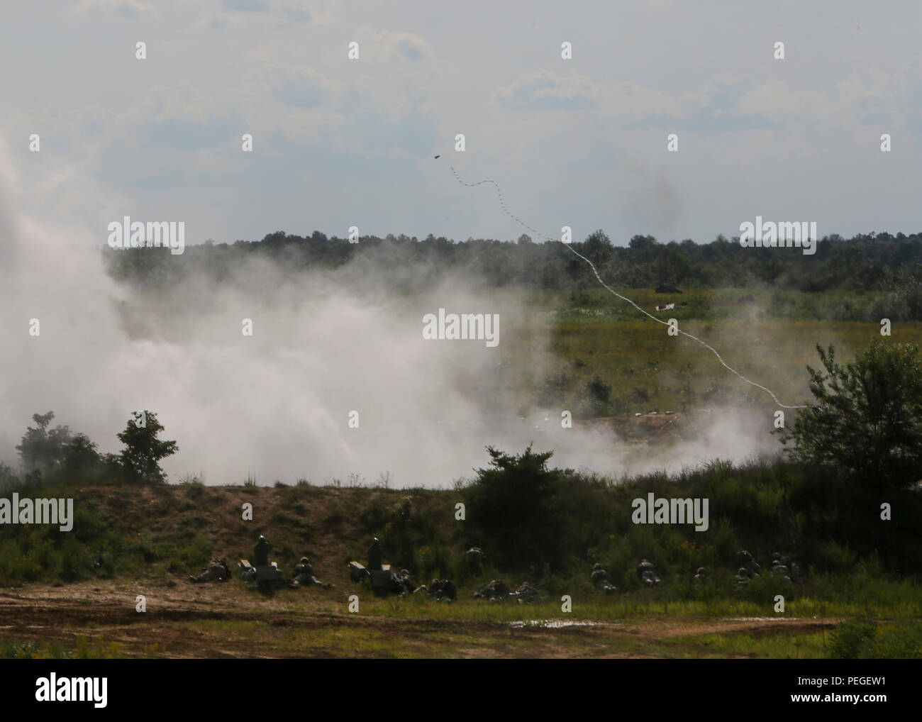 Marines with Alpha Company, 2nd Combat Engineer Battalion, take cover ...