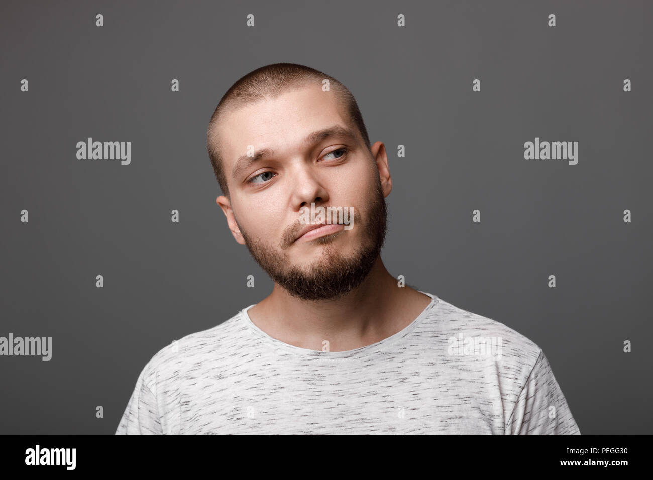 the portrait of the young bearded man Stock Photo - Alamy