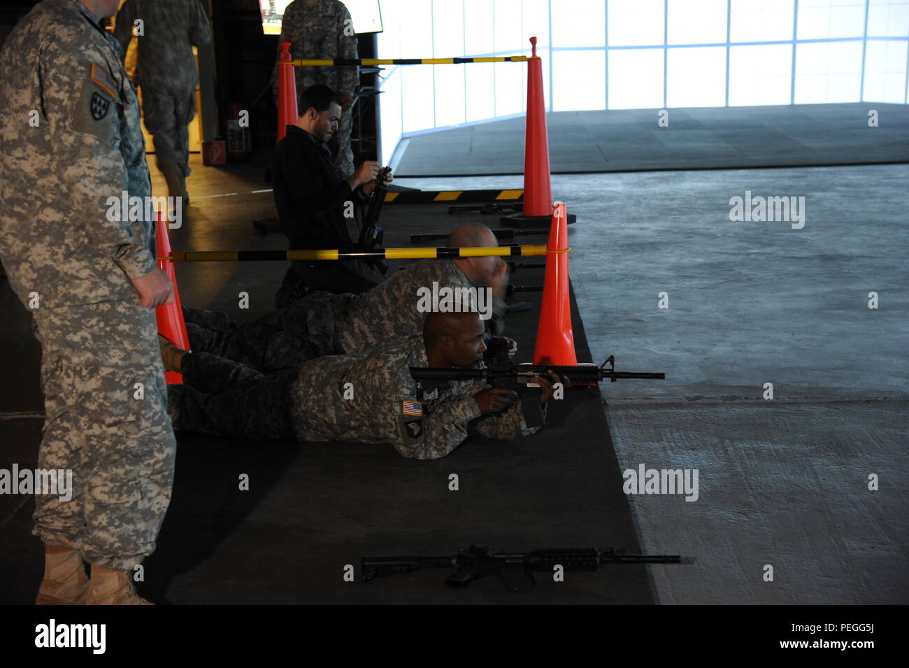 U.S. Soldiers demonstrate use of the new Gunfighter Gymnasium during ...