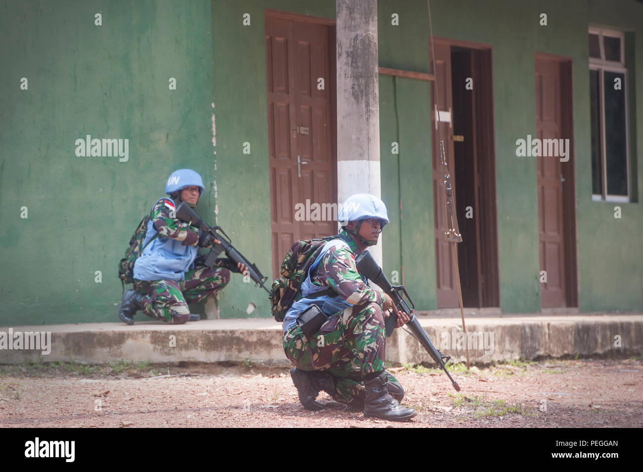 Indonesia National Armed Forces soldiers provide security at a ...