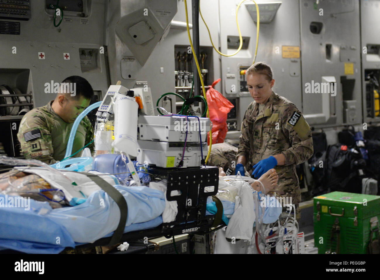 U.S. Capt. Deann Hoelscher, right, 455th Expeditionary Aeromedical ...