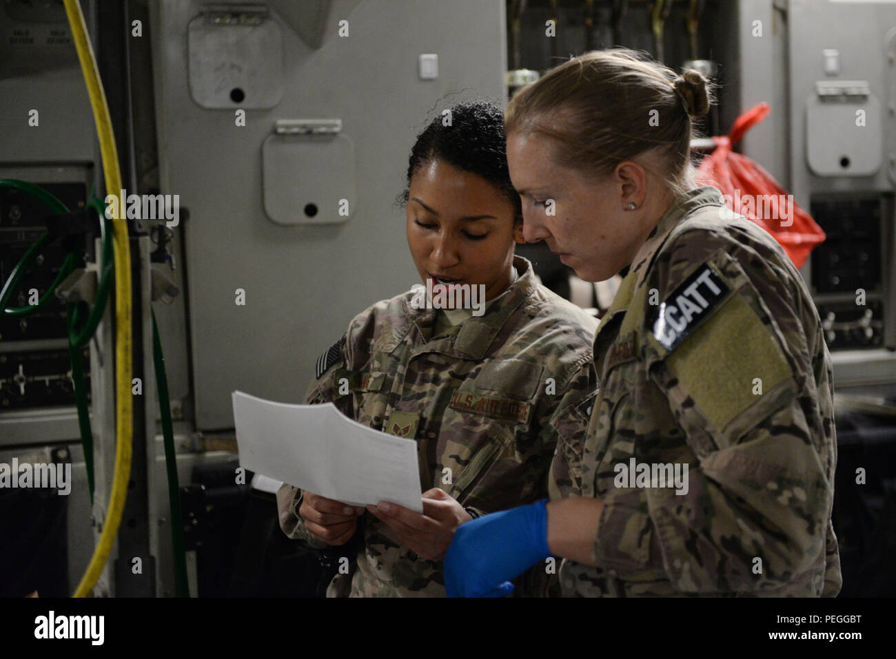 U.S. Capt. Deann Hoelscher, right, 455th Expeditionary Aeromedical ...