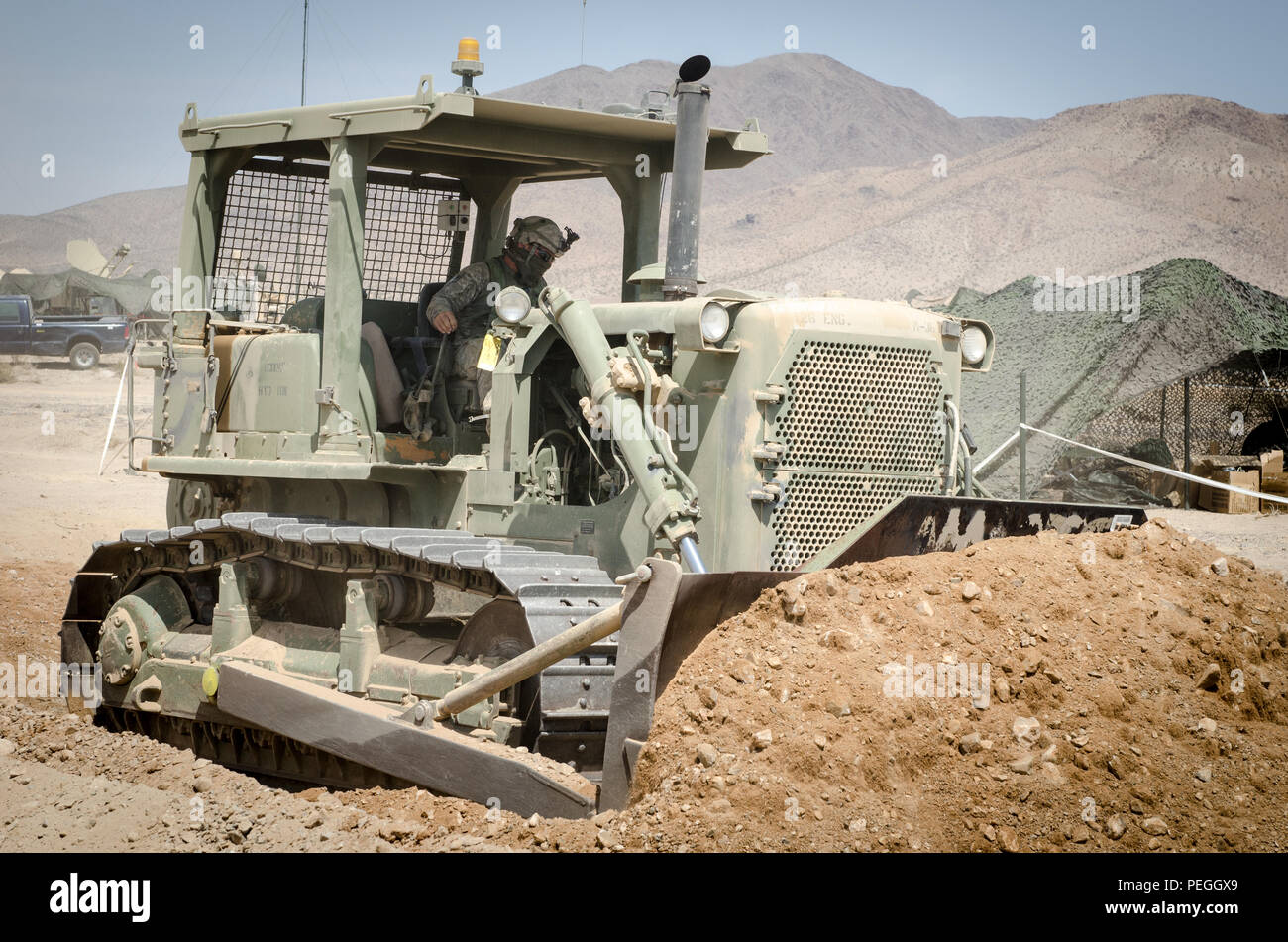 Idaho Army National Guard Sgt. Zachary Whitlock, a heavy equipment ...