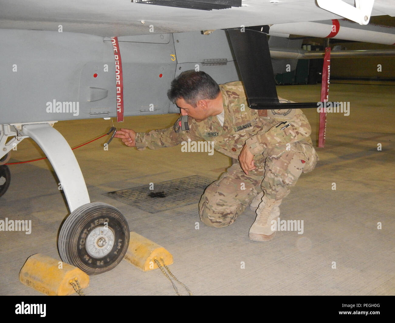 At Kandahar Airfield, the MQ-5B Hunter UAV is shown with its tailhook ...