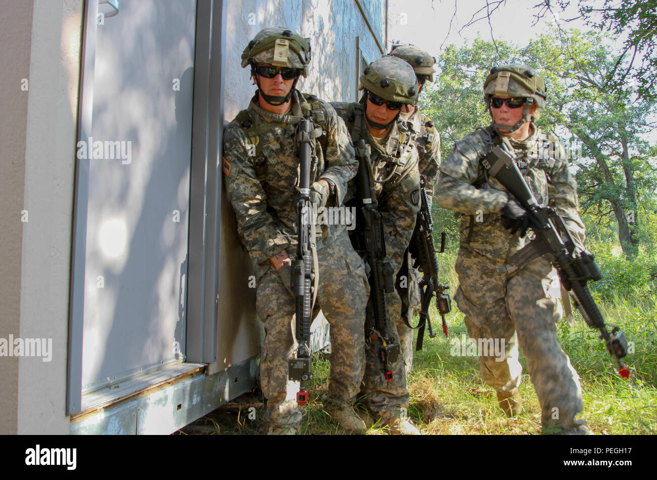 Spc. Bobbie Ann Mitchell, (right) a bridge crewmember assigned to the ...