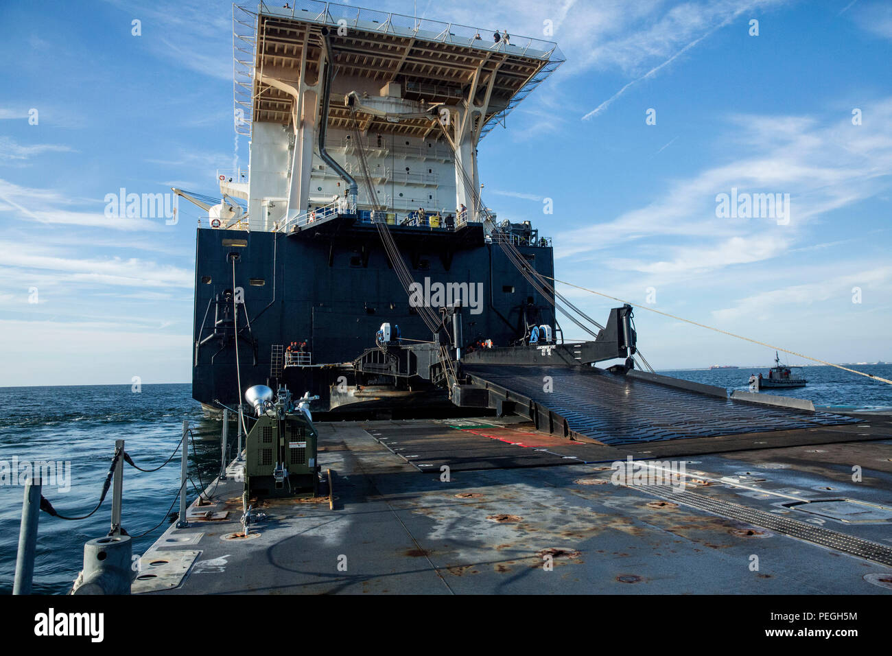 A ramp attached to the USNS 1st Lt. Jack Lummus rests on a Roll-on/Roll ...