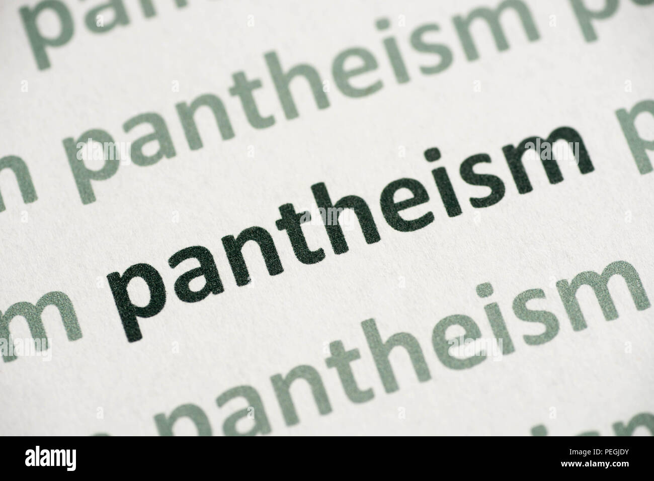 word pantheism printed on white paper macro Stock Photo - Alamy