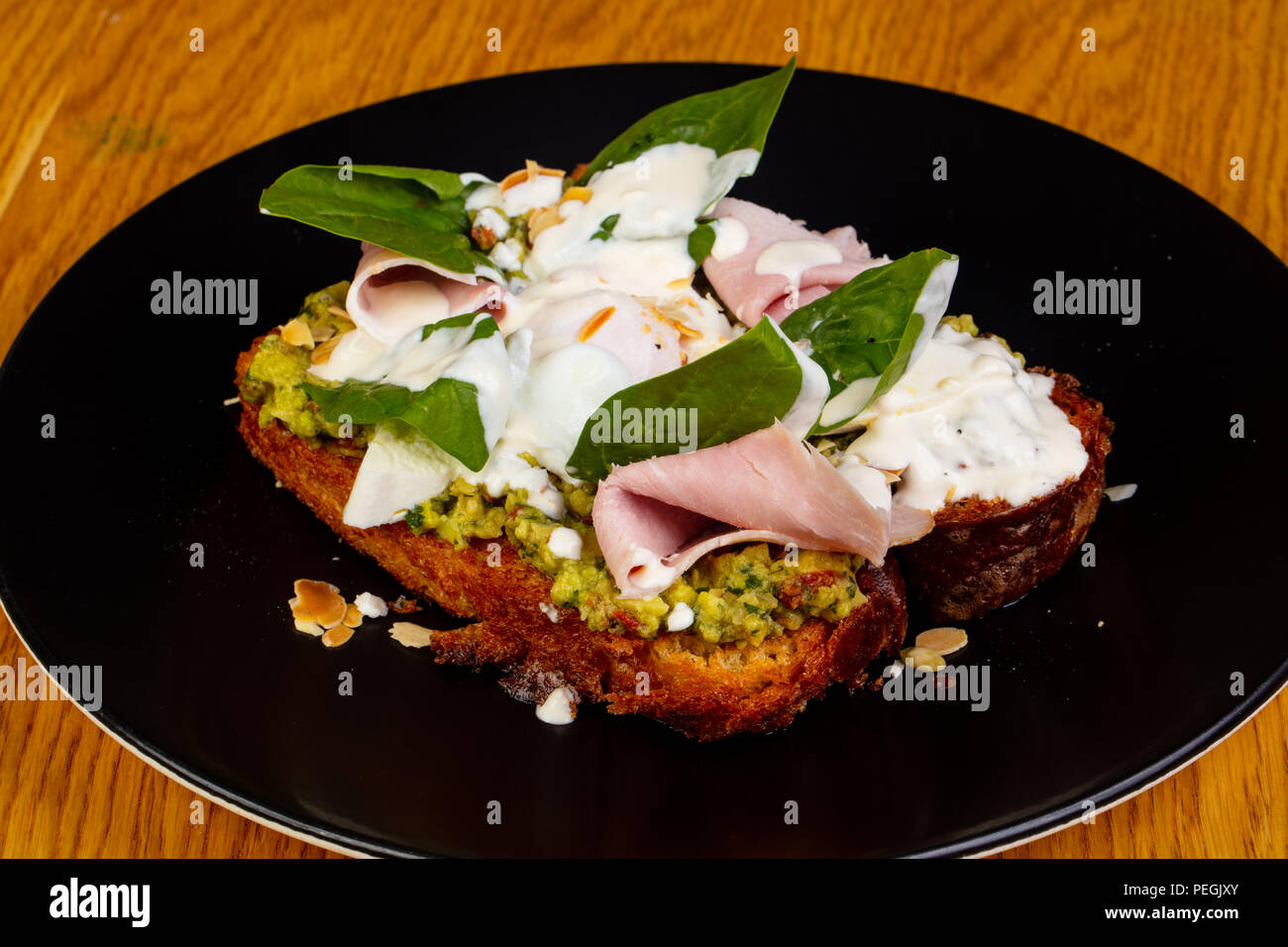 Brioche with ham and cheese Stock Photo - Alamy