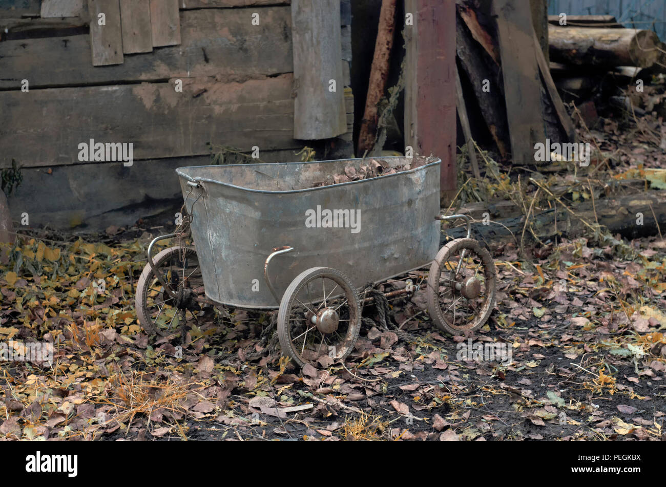 Vintage cart made from an old baby bath and wheels from a baby stroller ...