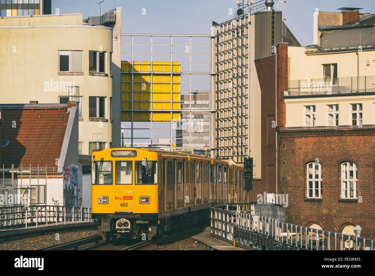 Berlin, Germany, August 02, 2018: Yellow Metro Train Against Buildings ...
