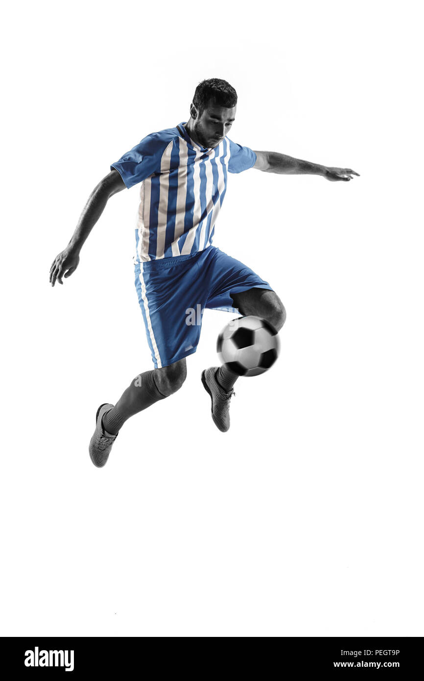 Professional football soccer player with ball isolated on white studio ...