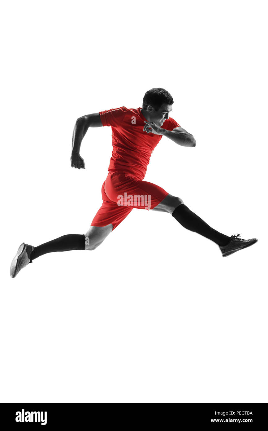 Professional football soccer player in motion isolated on white studio ...