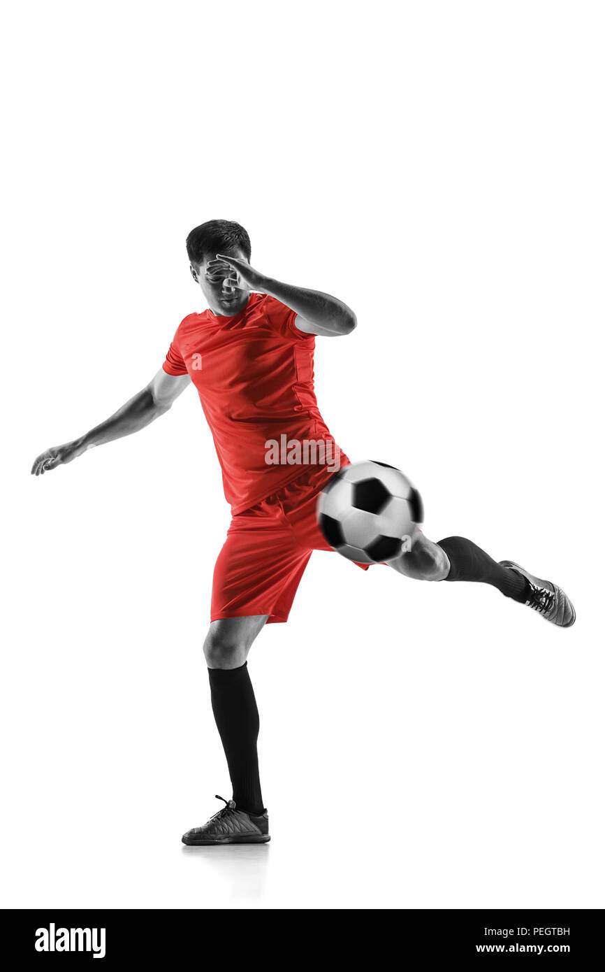 Professional football soccer player in motion isolated on white studio ...