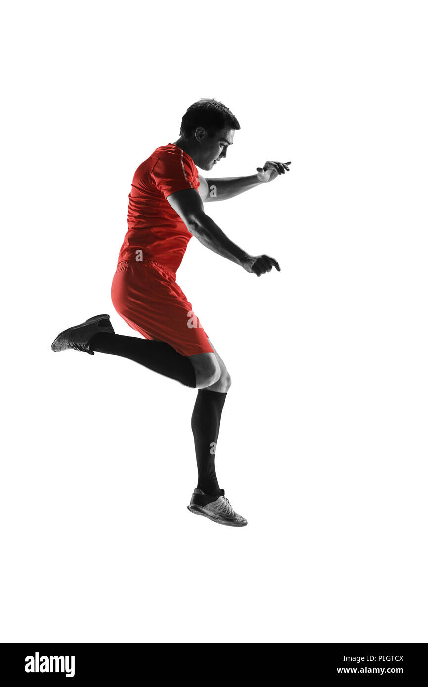 Professional football soccer player in motion isolated on white studio ...