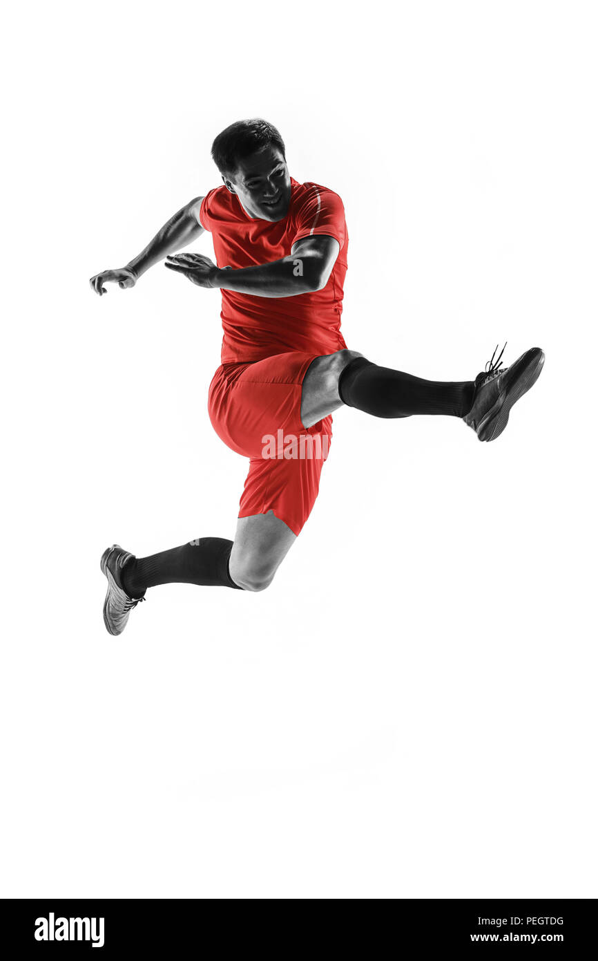 Professional football soccer player in motion isolated on white studio ...