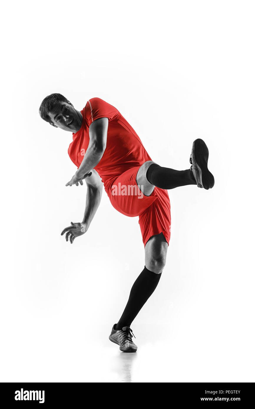 Professional football soccer player in motion isolated on white studio ...