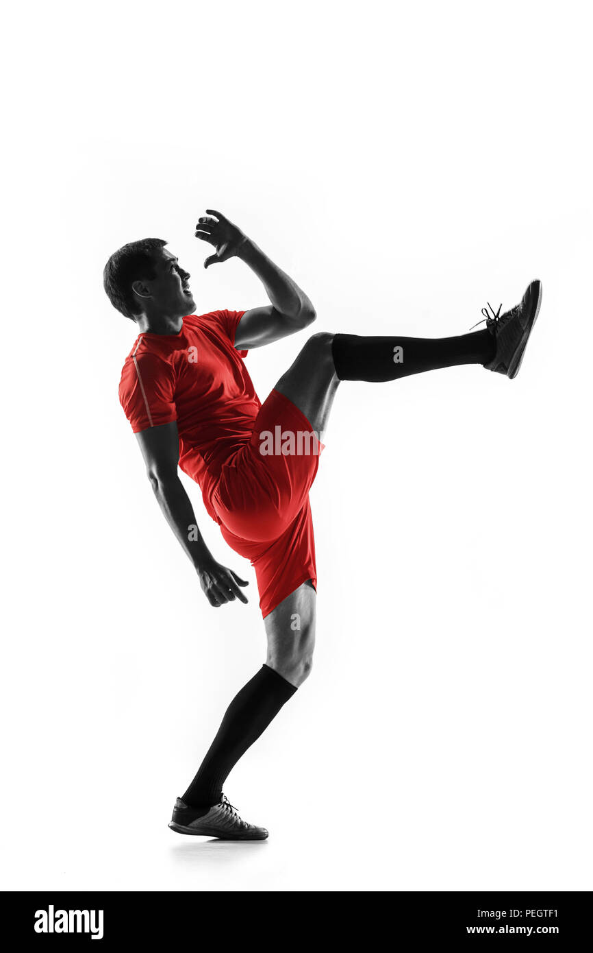 Professional football soccer player in motion isolated on white studio ...