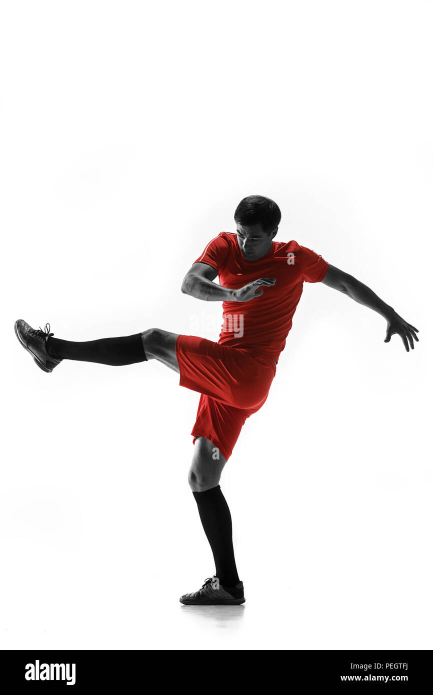 Professional football soccer player in motion isolated on white studio ...