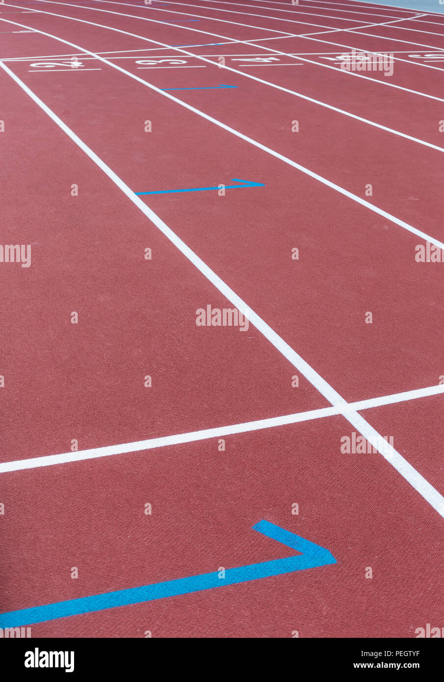 Red sport track for running on stadium starting marks. Running healthy ...