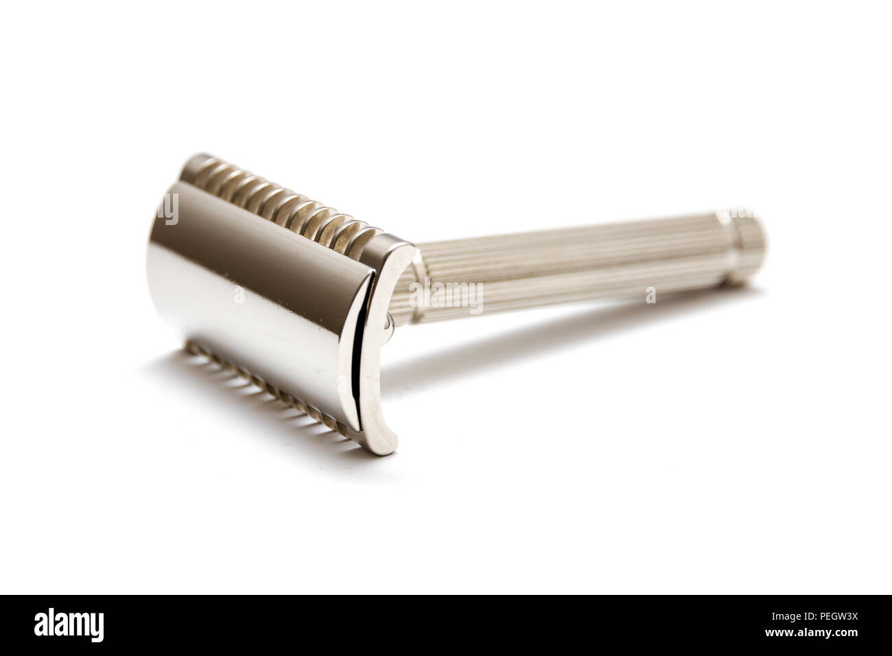 Traditional double edge open comb safety razor isolated on white ...